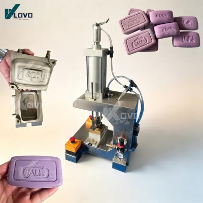 China Semi-auto soap stamping machine using precision brass molds tailored for different soap shapes and branding needs for sale