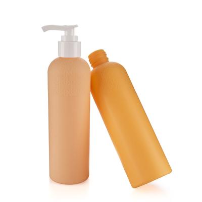 Cina 200 ml 6.6 oz bottiglia da spremitura a tocco morbido con pompa per shampoo in HDPE in vendita