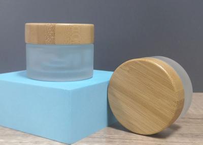 China JiaZi heló el tarro cosmético de cristal claro de la crema del bambú de las tapas 50g del grano de madera del tarro en venta