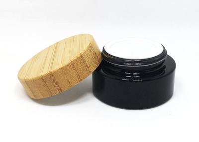 Cina contenitori vuoti del burro del corpo del barattolo cosmetico di vetro di bambù di 50ml 100ml con la scatola di carta in vendita