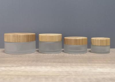 Cina l'unguento di vetro verde 50ml stona il barattolo crema glassato coperchio di bambù Logo Customization in vendita