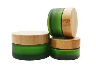 Cina l'unguento di vetro verde 50ml stona il barattolo crema glassato coperchio di bambù Logo Customization in vendita