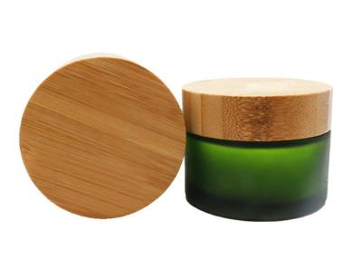 Cina l'unguento di vetro verde 50ml stona il barattolo crema glassato coperchio di bambù Logo Customization in vendita