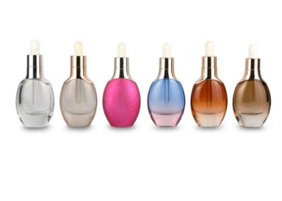 Cina Il cosmetico vuoto unico di forma 1oz imbottiglia Logo With Rose Gold Dropper su ordinazione in vendita