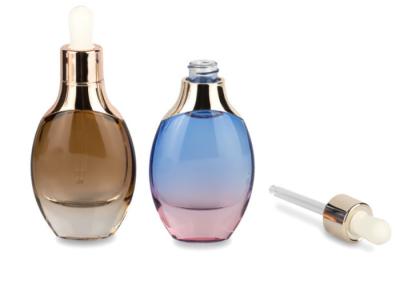Cina Il cosmetico vuoto unico di forma 1oz imbottiglia Logo With Rose Gold Dropper su ordinazione in vendita