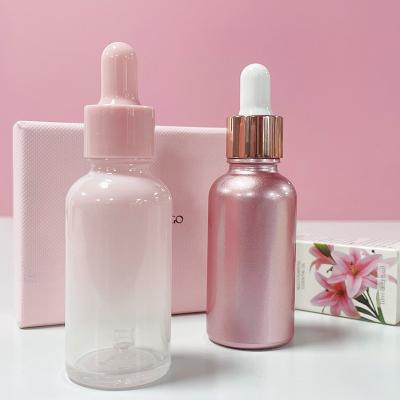 Cina Bottiglia di lusso rotonda 5ml 10ml 15ml 30ml 100m del contagoccia di occhio di vetro di rosa di pendenza del siero in vendita