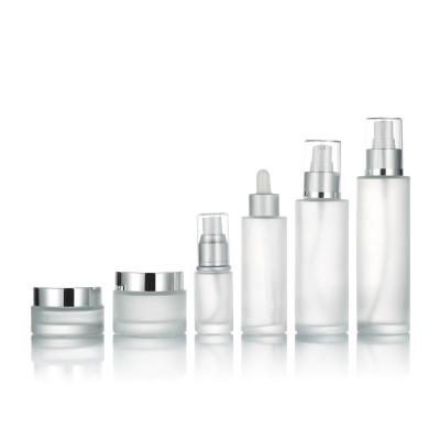 China Custom Printing 250ml 8oz Matte Black White Boston Round Empty Cosmetic Glass Shampoo Pump Lotion Bottle for sale