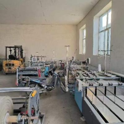 China Used Electric Automatic PP Woven Bag Cutting Sewing Machine for sale