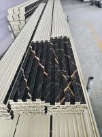 China Interlocking Acoustic Film-Laminated Indoor WPC Fluted Wall Cladding for sale