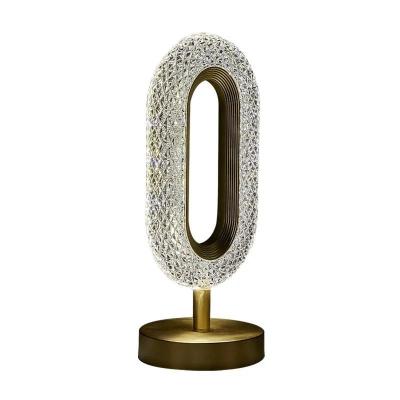 China Modern Bedroom Bedside Table Lamp Gold Acrylic Metal LED Table Lamp for sale