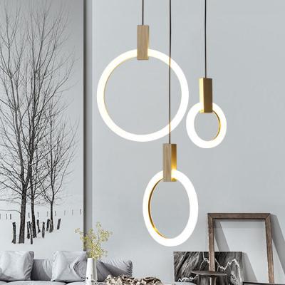 Cina Le lampade della scala del salone mandano in aria la luce acrilica d'attaccatura del pendente degli anelli del metallo della sospensione in vendita
