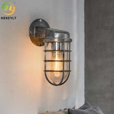 Cina Lampada da comodino di vetro della lampada da parete del ferro della retro della lampada da parete di Art Dining Room Living Room dell'abbigliamento cavità industriale del negozio in vendita