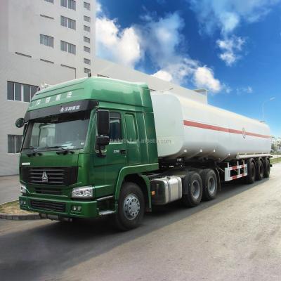 China Truck Trailer 42000L 28T Carbon Steel Fuel Or Refuel Tank Semi Trailer for Tanzania for sale