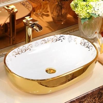 China Modern design ceramic big size oval golden bathroom wash art basin for sale
