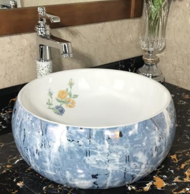 China Modern style blue color luxury decal bathroom sanitary ware countertop round no hole wash hand basin for sale