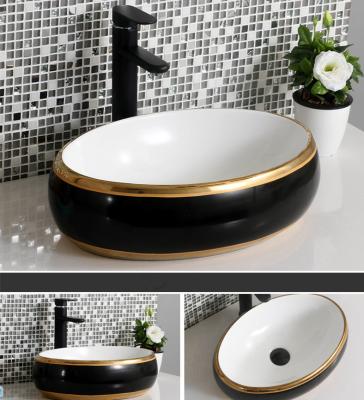 China Home design oval luxury ceramic countertop ceramic black color art basin sink for sale