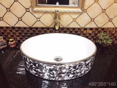 China Good sale bathroom tabletop ceramics luxury round shape no hole big size Slivery decoration wash hand art basin sink for sale