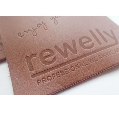 Cina ODM Logo in rilievo Patch in pelle vera per abbigliamento e cappelli in vendita