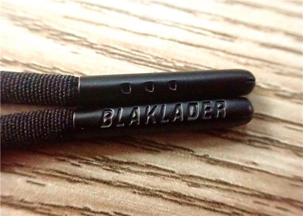 Quality 125cm Black Non Elastic Cord With Carved Logo At Both Ends Of The Black Paint for sale