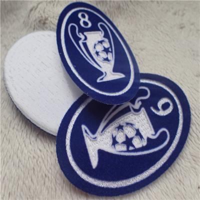 Cina Forma ovale Patch personalizzati ricamati Uniforme a sfera Plush Monocromo Flocking Transfer di calore in vendita