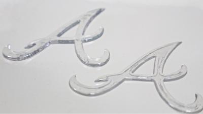 China Custom Imitate Ice Semi Transparent Glossy TPU Logo Heat Transfer Badge For Garment for sale