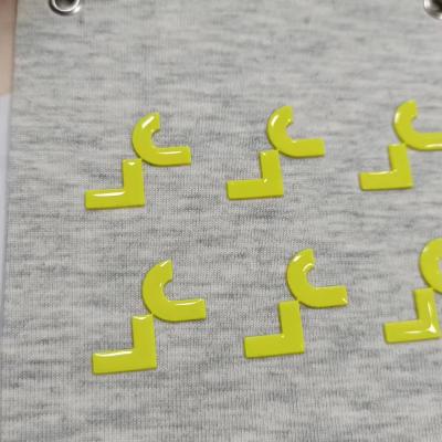 Cina 3D embossed shine logo abbigliamento in ferro badge di calore di gomma silicone patch di trasferimento di calore in vendita