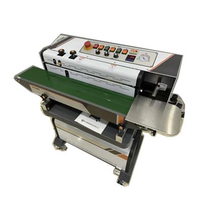 China Automatic Vacuum Filling Nitrogen Gas Flushing Continous Band Sealer Machine Bag Sealing Machine With Code Printer for sale
