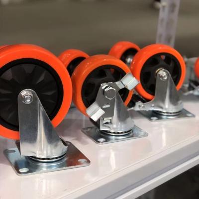 China Orange Double Ball Bearing Castor Wheels 100mm With Side Brake for sale