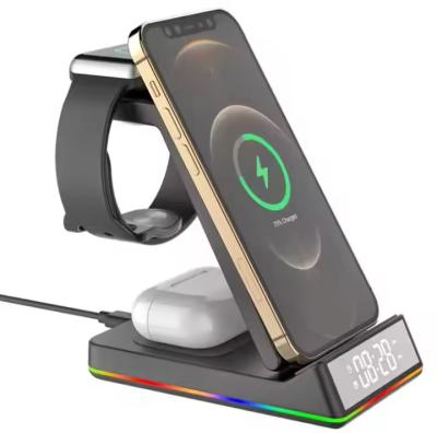 China 5 in 1 Portable Magnetic Wireless Chargers Multi-function Fast Phone Chargers Electronic Clock for Phones Smart Watches for sale