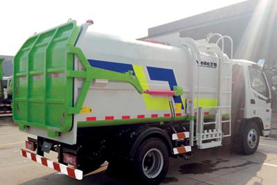 China Self-Loading Unloading Garbage Truck  Weight: 7,300kg Garbage Tank Volume: 7m3 Truck Speed: 95km/h, 90km/h for sale