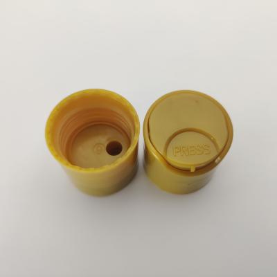 Cina Tappo superiore giallo del disco del polipropilene 24mm per la bottiglia dello sciampo in vendita