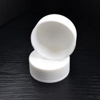 China 40mm Ribbed Detergent Bottle Plastic Screw Cap Customized Logo for sale