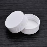 China 40mm Ribbed Detergent Bottle Plastic Screw Cap Customized Logo for sale