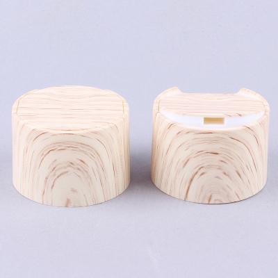 China Bamboo Wood Grain Water Transfer Printing Disc Top Cap Lotion Bottle Conditioner Cosmetics Bottle Cap for sale