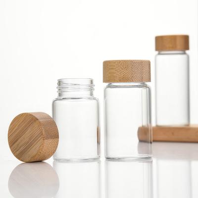China Bamboo lid medicine bottle, liquid vial, storage jar, glass bottle, airtight jar, bamboo wood lid flower tea jar for sale