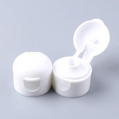 China Plastic 20/24/28 MM flip top cap PP material ball shape flip cap for hand sanitizer/toner/lotion/makeup bottle flip cap for sale
