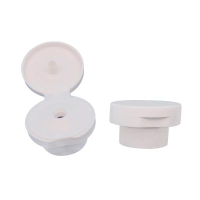 China 24mm Shampoo Bottle Cap Oval Style Lotion plastic Flip top cap for sale