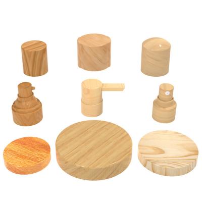 China Imitation bamboo wood grain plastic cap Cosmetic bottle wood grain cap for sale