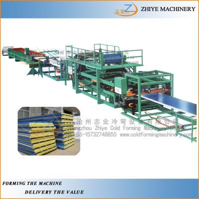 China Cangzhou High Efficiency Eps Or Rockwoll Sandwich Panel Cold Rolling Forming Line for sale