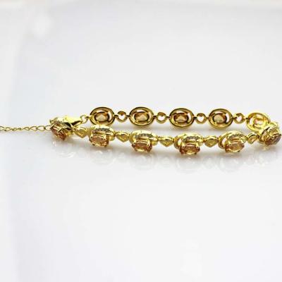 China Gold Plated Silver with 5x7mm Oval Champagne Citrine and Clear Cubic Zircon Tennis Bracelet(B06CHAMPAGE) for sale