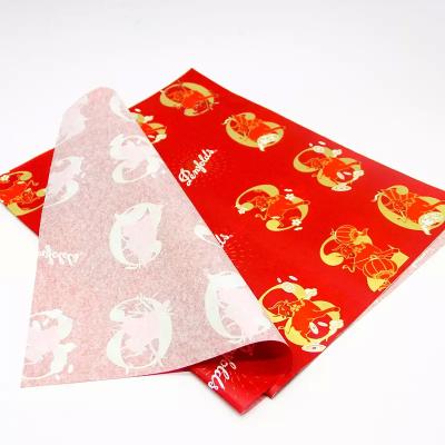 Cina Confezione regalo di Natale Confezione di carta velina rossa con stampa floreale in lamina d'oro in vendita