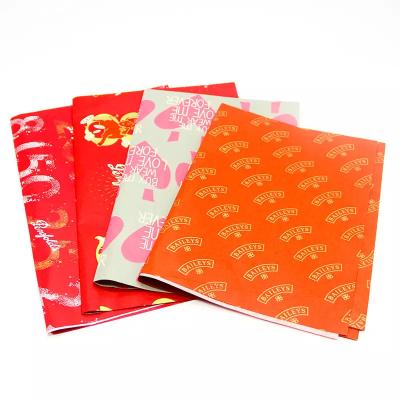 Cina Confezione regalo di Natale Confezione di carta velina rossa con stampa floreale in lamina d'oro in vendita