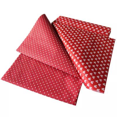 Cina Confezione regalo di Natale Confezione di carta velina rossa con stampa floreale in lamina d'oro in vendita