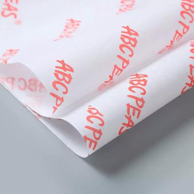 Cina Involucro di carta velina stampata personalizzata con logo arancione per regalo facciale con ghirlanda di fiori in vendita