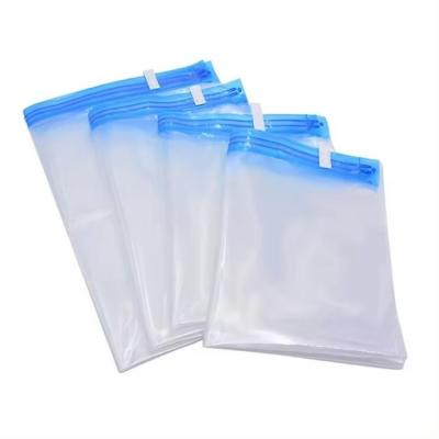 China Customized Travel Vacuum Storage Bag Plastic Packing Hand Roll Vacuum Bag With Zipper For Luggage for sale