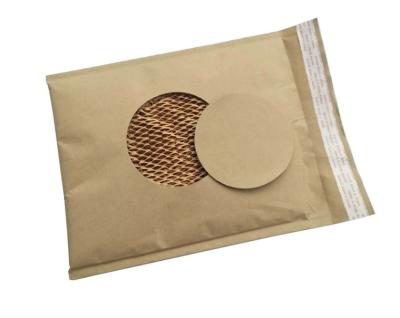 China Fully Biodegradable And Compostable Kraft Corrugated Envelopes Lining Padded Honeycomb Paper for sale