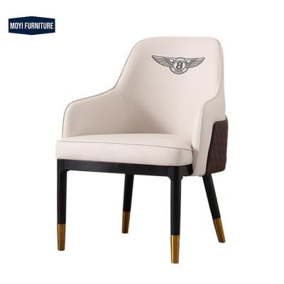 China Synthetic Leather Optional Dining Room Chair with Durable Solid Wood Leg and Stainless Steel Frame Nordic Luxury Design for sale