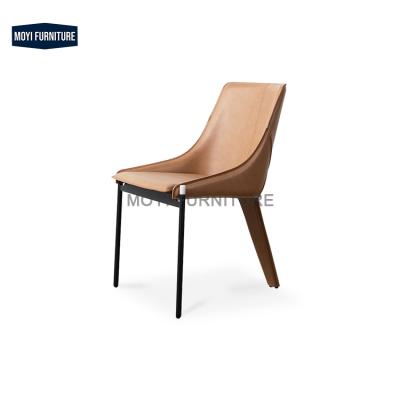 China Refined Top-Stitching  Leather Upholstered Comfortable Padded Dining Room Dining Chairs With Unique 3-Leg Structures for sale