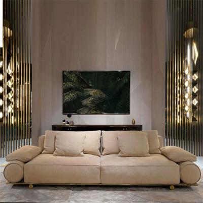 China Modern Beige Fabric Sofa With Gold Accents and Soft Cushions for sale