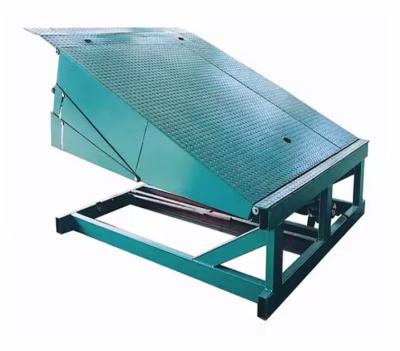 China Nivelador de muelle de carga hidráulico estacionario con altura de cubierta y tamaño de plataforma personalizables en venta